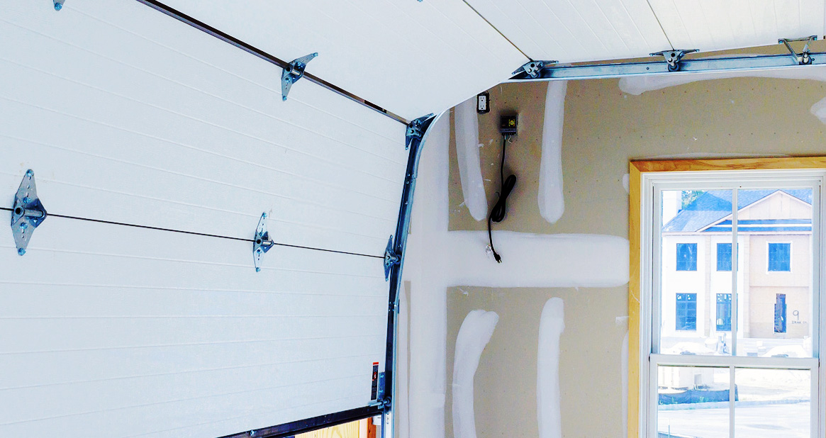 How To Get Roller Back On Garage Door Track - Garage Blog